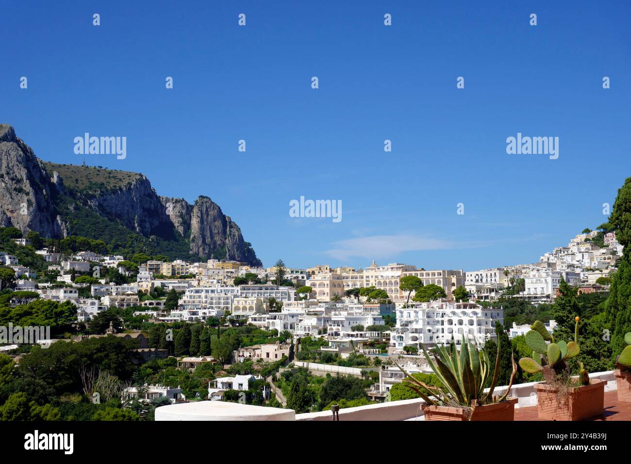 Scenic view of hillside town in Capri, Italy with white buildings under ...