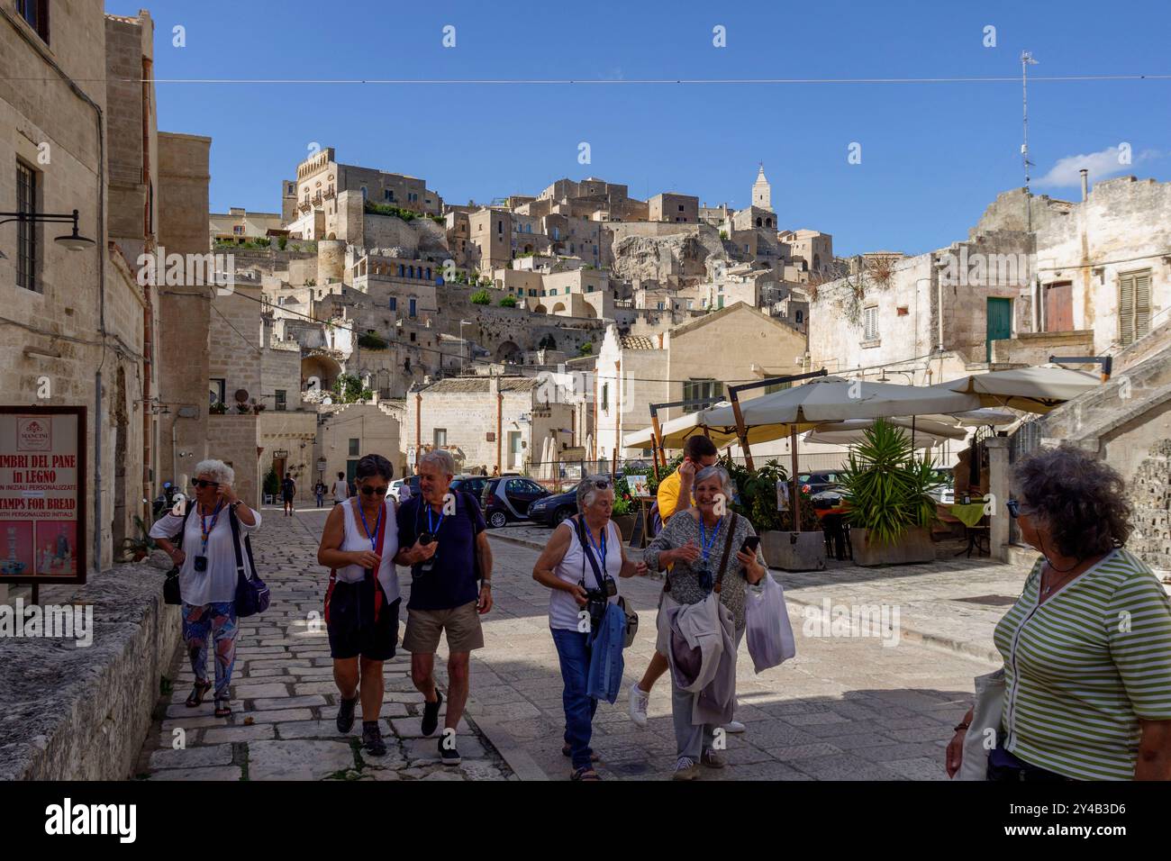 Historic cityscape of Matera with ancient stone buildings and rugged ...