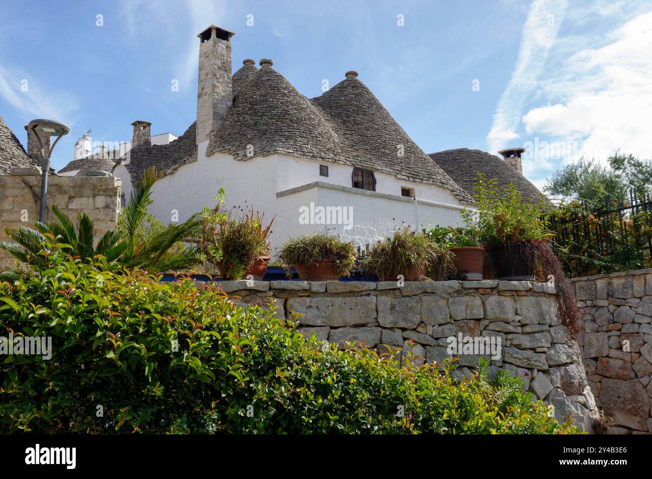 Traditional trullo buildings of Alberobello, Italy, Europe Stock Photo ...