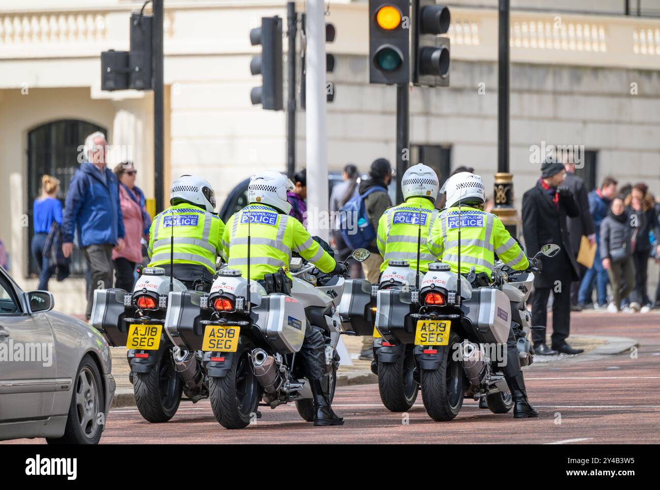 London, UK. Four Metropolitan Police motorcycle riders at traffic ...