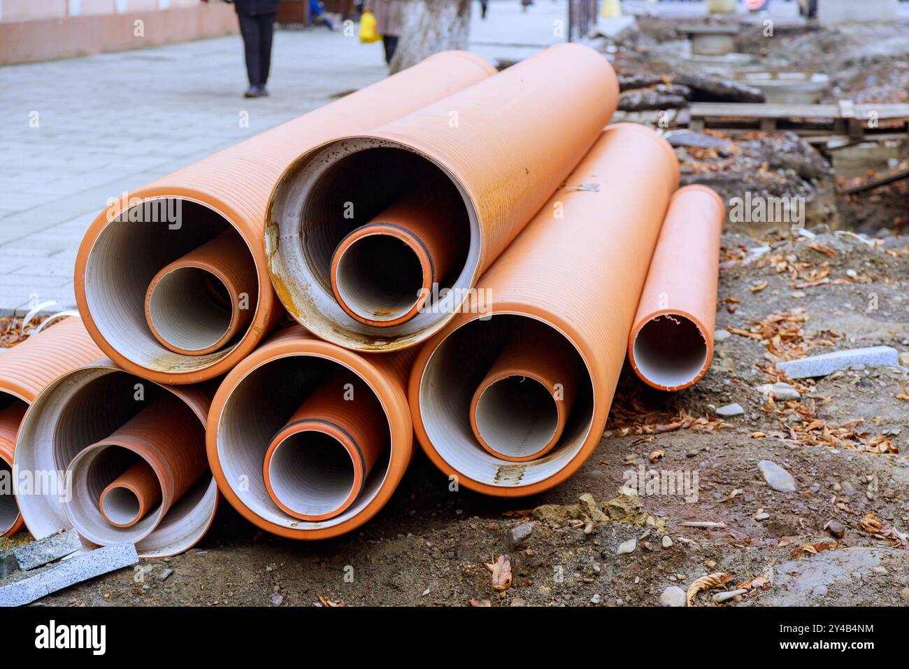 Sewer pipes made of HDPE polyethylene awaiting installation as backbone ...