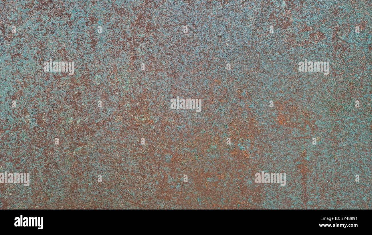 Close-up of rusted metal with a weathered patina texture. The intricate ...