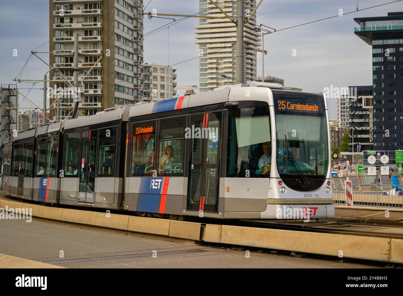 A moving RET Dutch tram crossing the Erasmus Bridge in Rotterdam, The ...