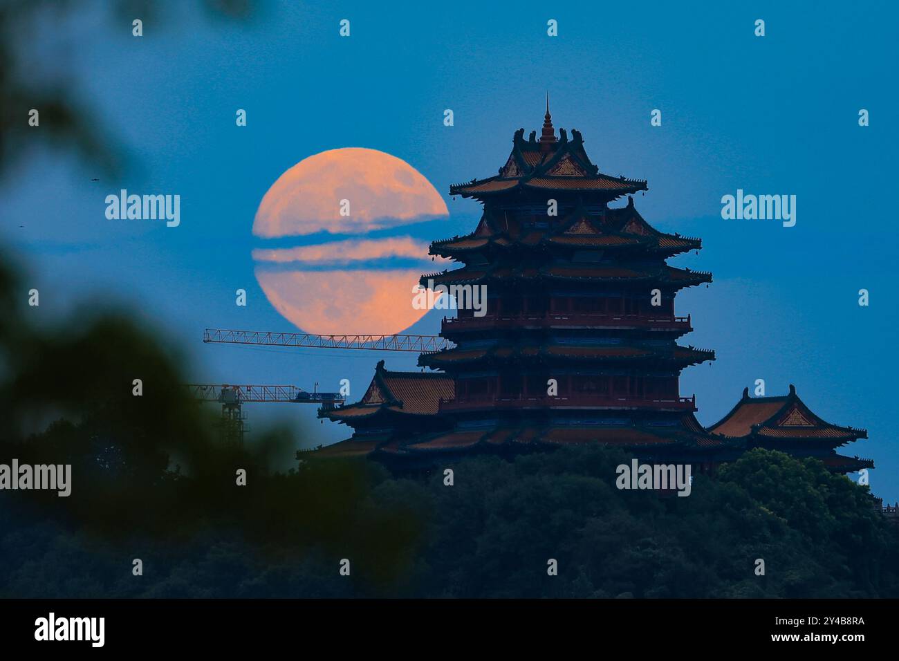 Beijing, China's Jiangsu Province. 17th Sep, 2024. The moon rises above ...
