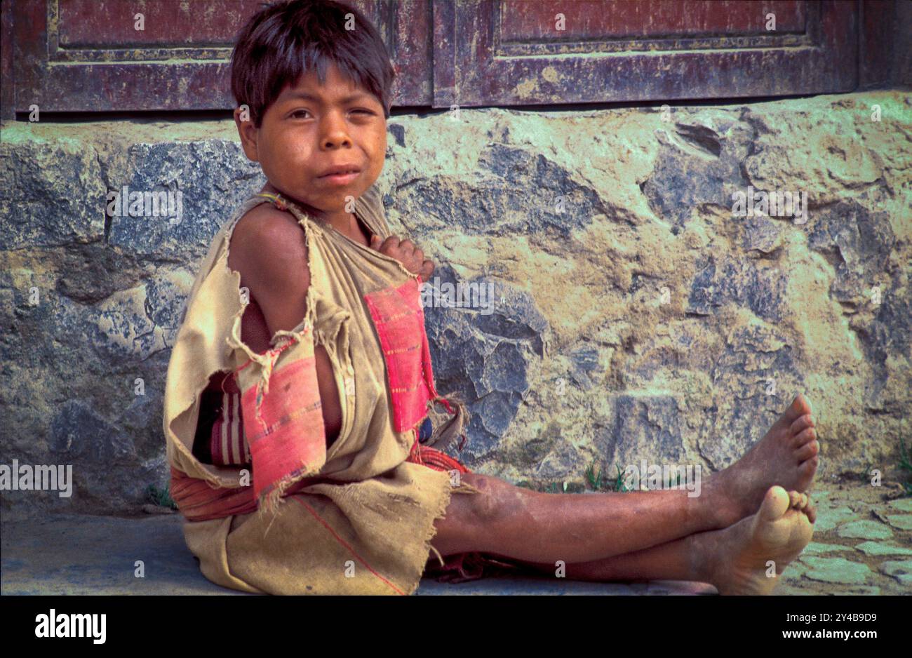 Mexico, Oaxaca - Street child wearing rags Stock Photo - Alamy