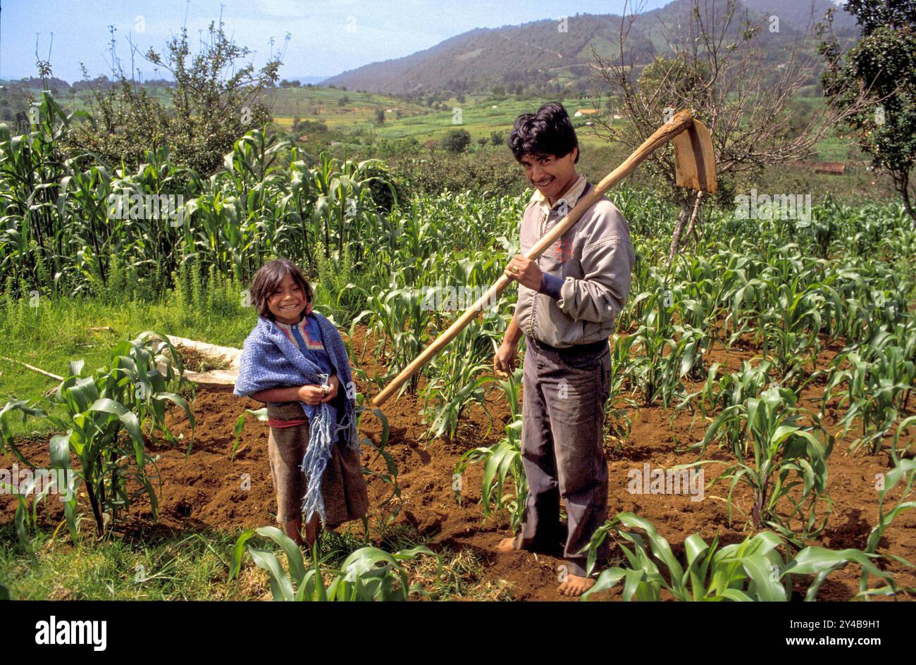 Mexico, San Cristobal region in Chiapas. Maya father and daughter are ...