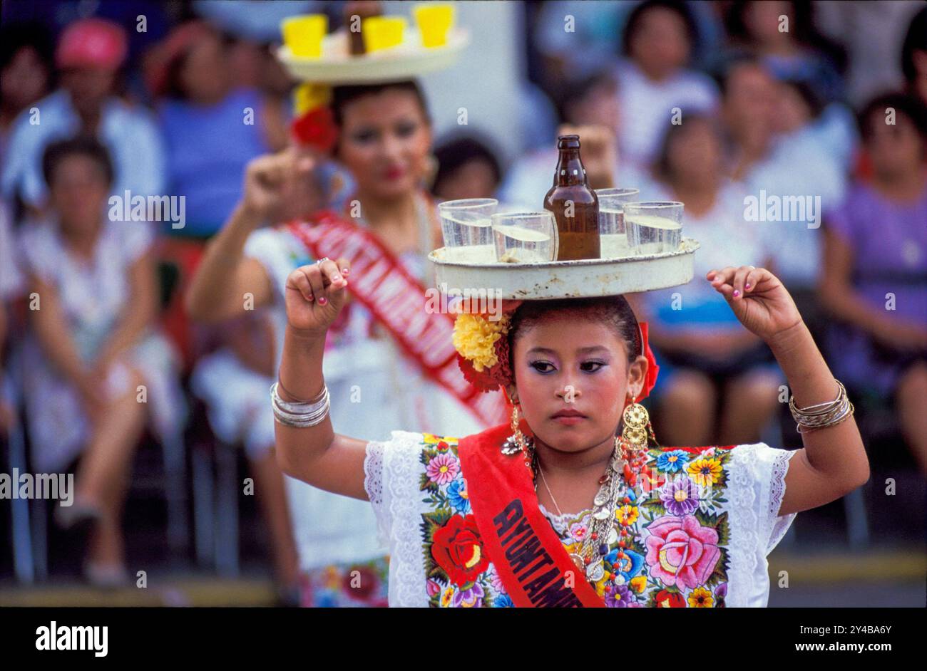 Mexico, Merida, Yucatan. Woman is dancing a traditional dance at a folk ...