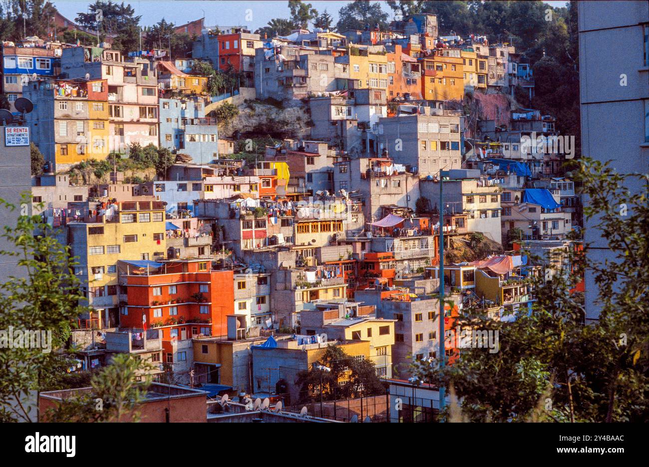 Mexico, Mexico City. Apartments built on a hill in a poor district ...