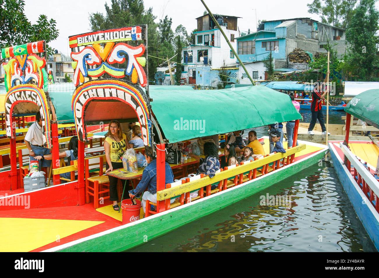 Mexico - With colored gondolas, trajineras, you sail past the floating ...