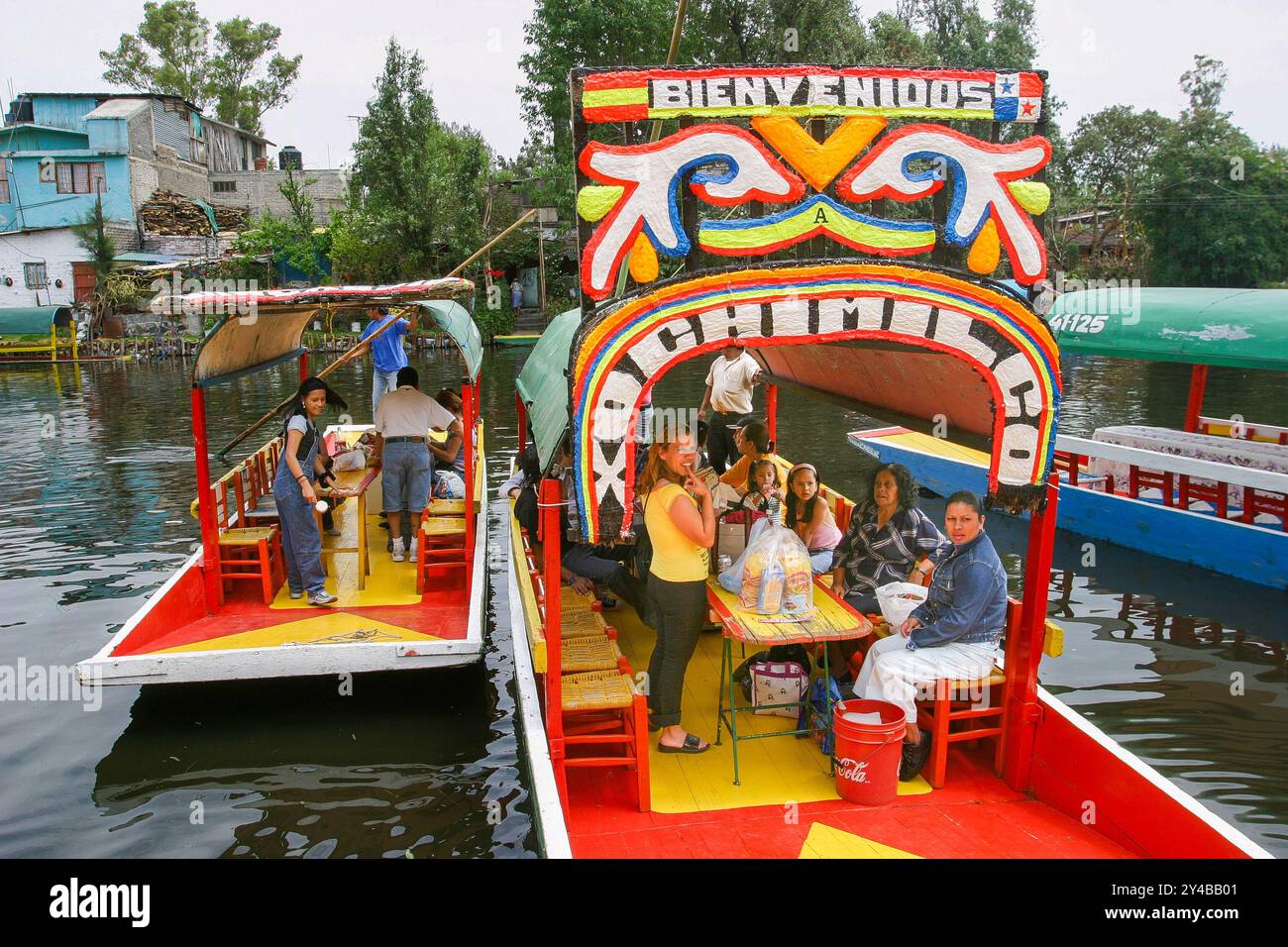 Mexico - With colored gondolas, trajineras, you sail past the floating ...
