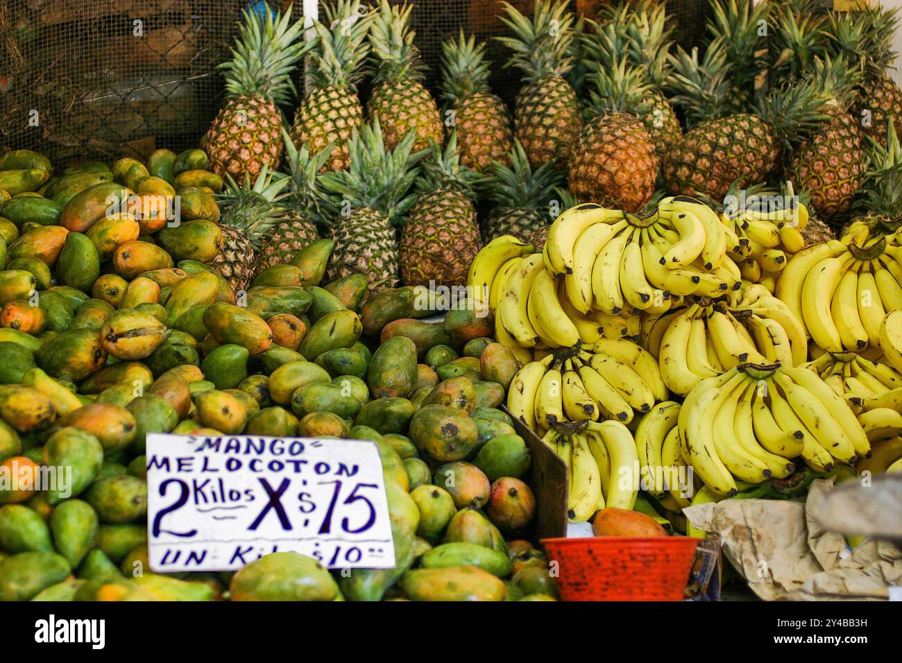 Mexico, fruit stall on the market of Guadalajara selling mangos ...