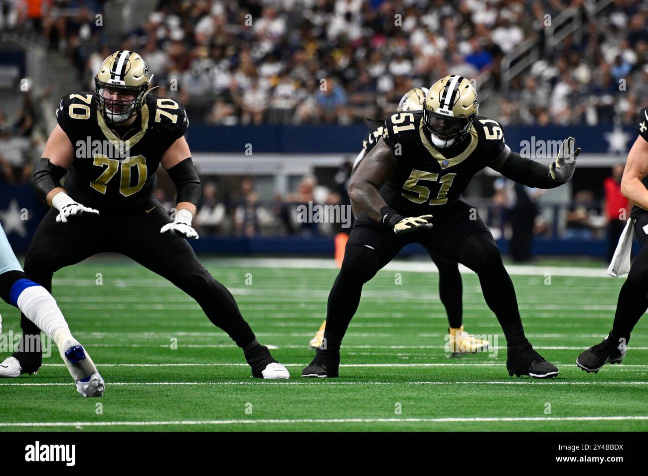 New Orleans Saints offensive tackle Trevor Penning (left) and center ...