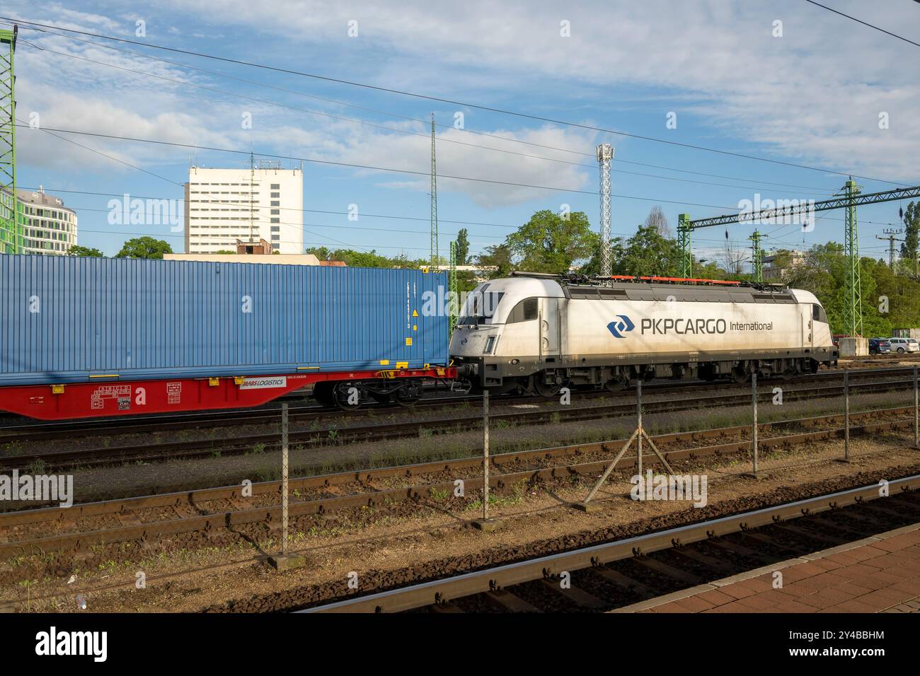 Freight train with shipping containers Stock Photo - Alamy