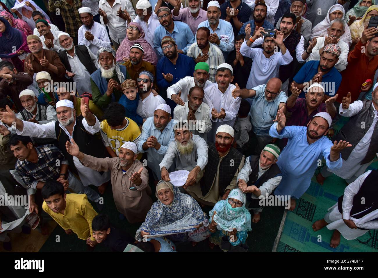 Srinagar, India. 17th Sep, 2024. Kashmiri Muslim devotees pray as the head priest (not pictured ...