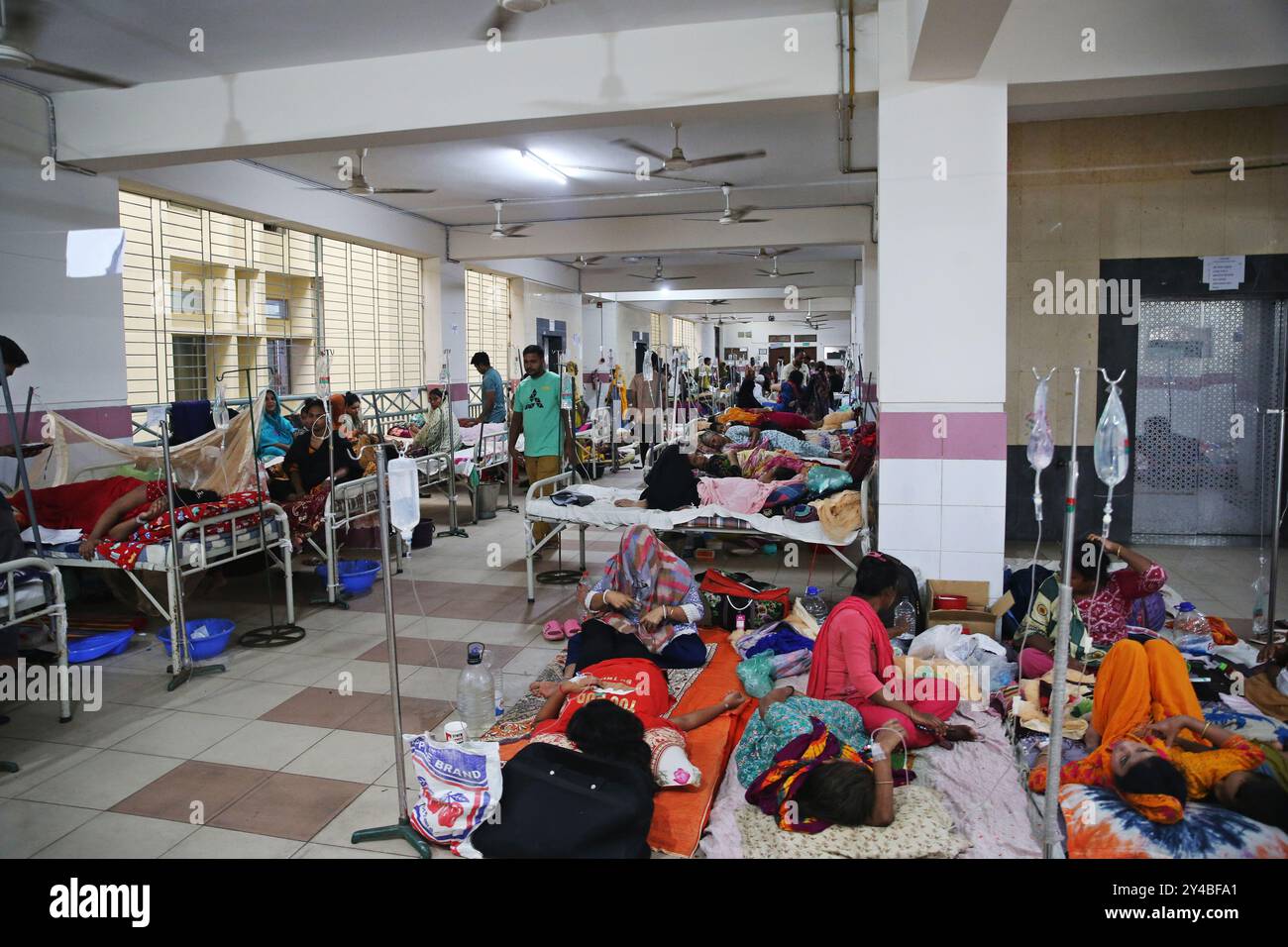 People suffering from dengue fever receive treatment at Mugda Medical ...