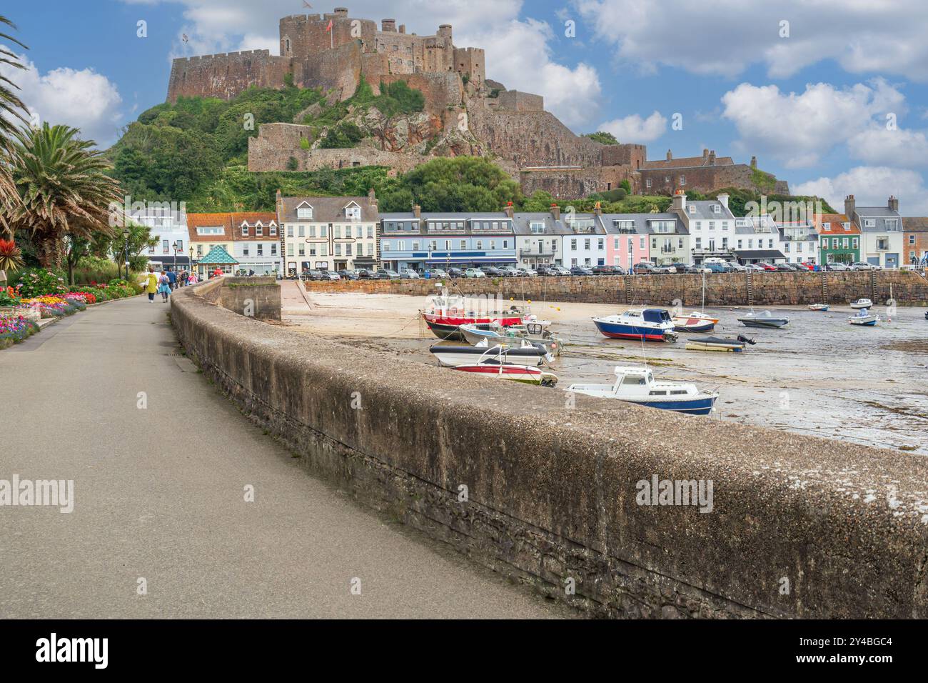 Looking down the promenade to Gorey Castle on tyhe island of Jersey one ...