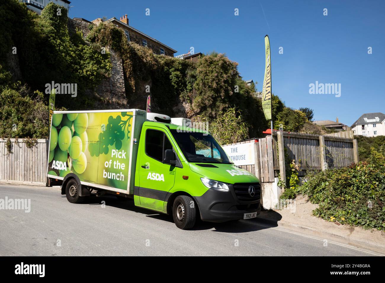An ASDA delivery van truck vehicle parked on a road in Newquay in ...