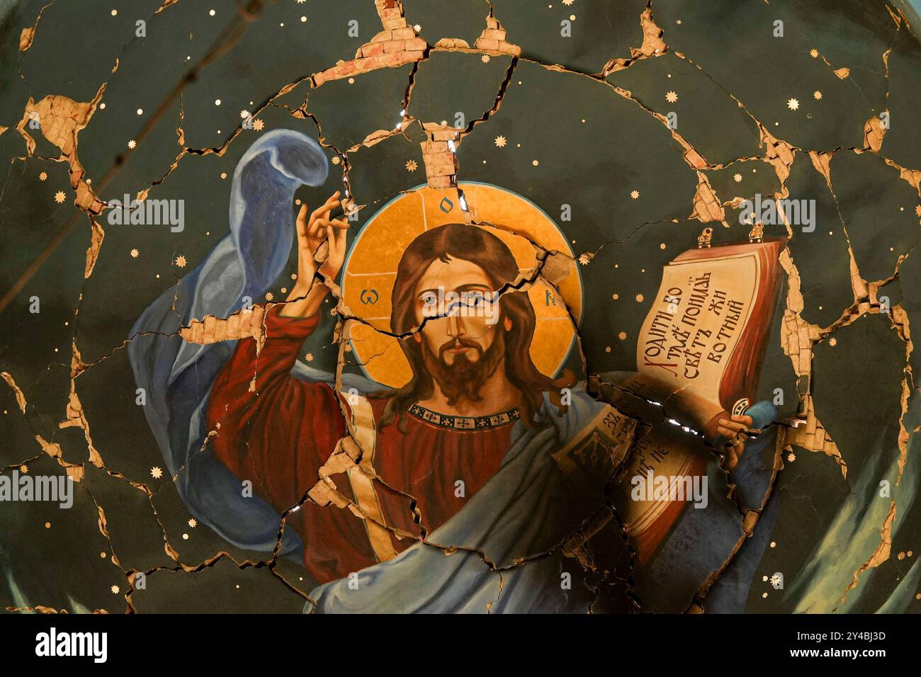 Painting of Jesus covered in cracks after Russian bomb hit dome of ...