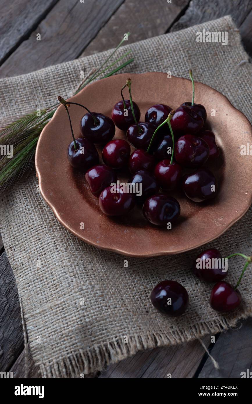 still life cherry rustic dramatic dark background effect Stock Photo ...