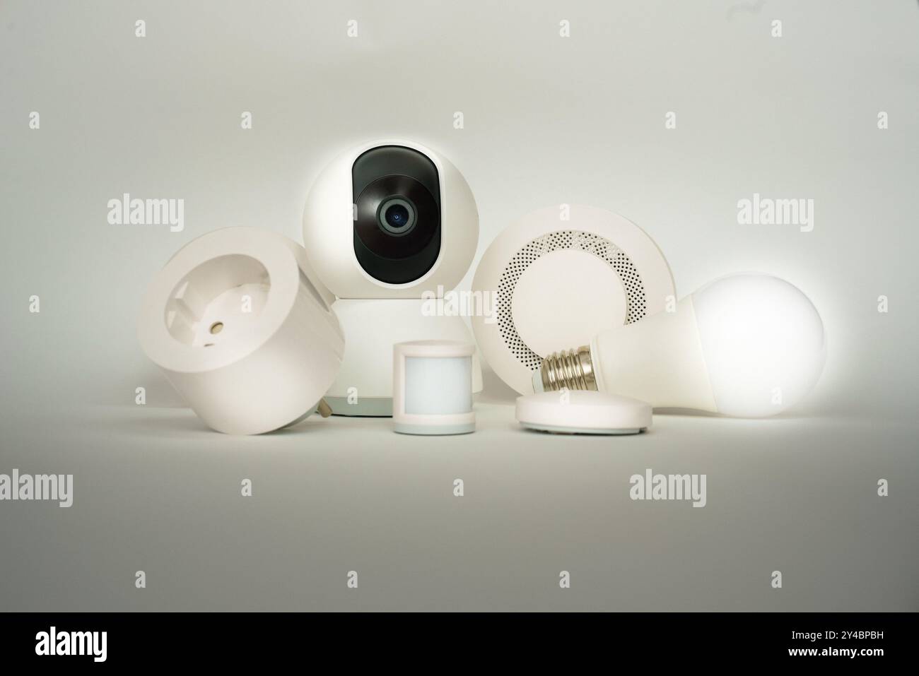 Smart home devices. Remote controlled camera. Light bulb sensor button ...
