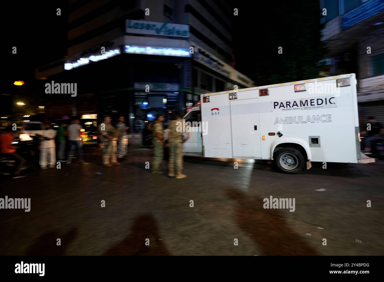 An ambulance carries wounded people whose handheld pager exploded ...