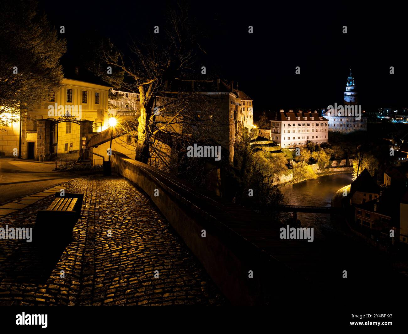 Nighttime stroll along the illuminated pathway of Český Krumlov Stock ...