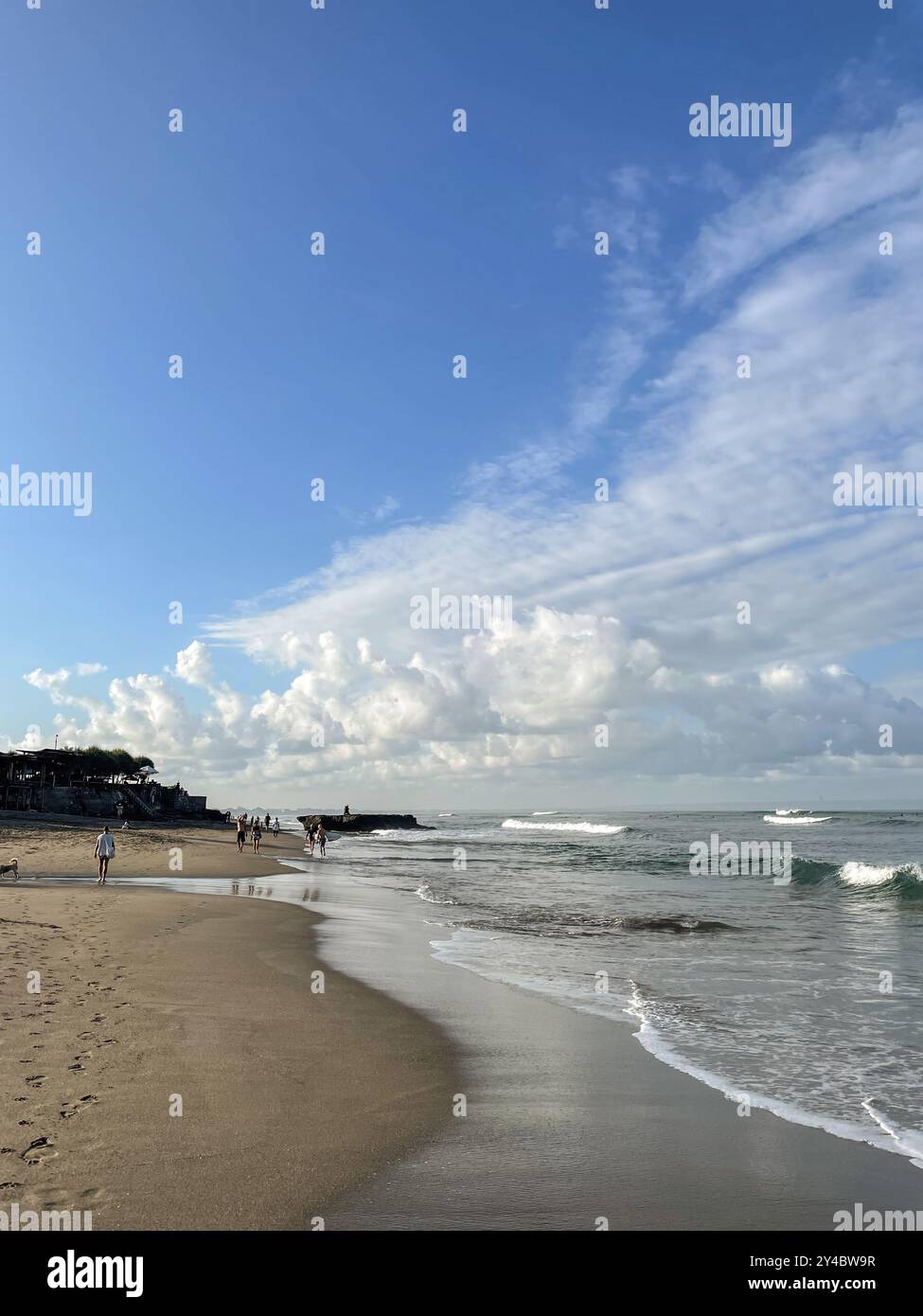 One of Canggu beach, famous surfing beach Batu Bolong, ocean waves and ...