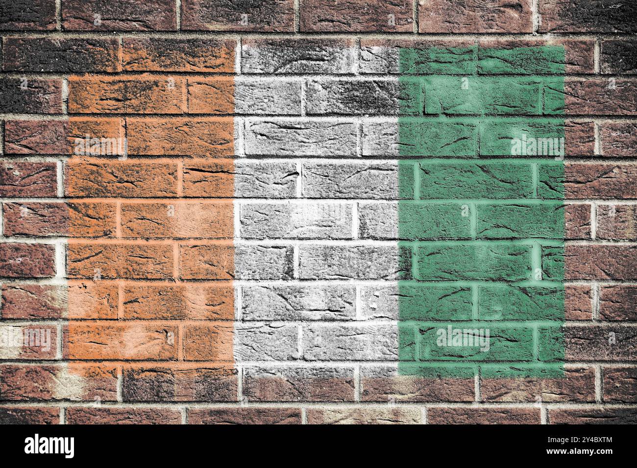 An Ivory Coast Cote DIvoire flag on an old brick wall Stock Photo - Alamy