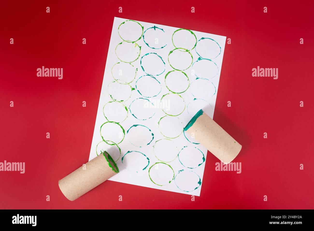 Christmas cards decorated with green circular patterns using stamps ...