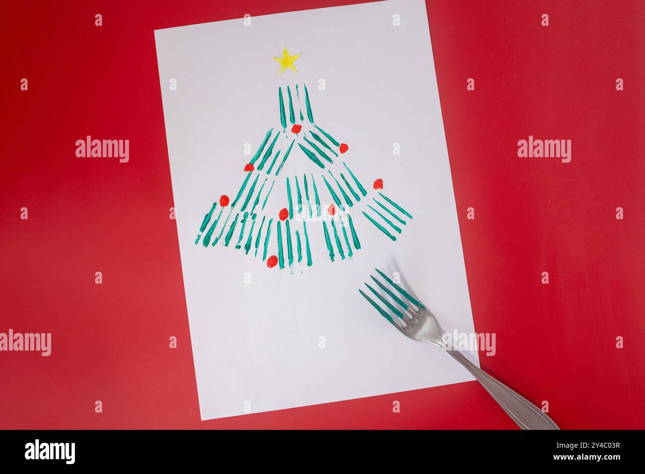 Christmas tree craft using fork painting technique, green fir tree with ...