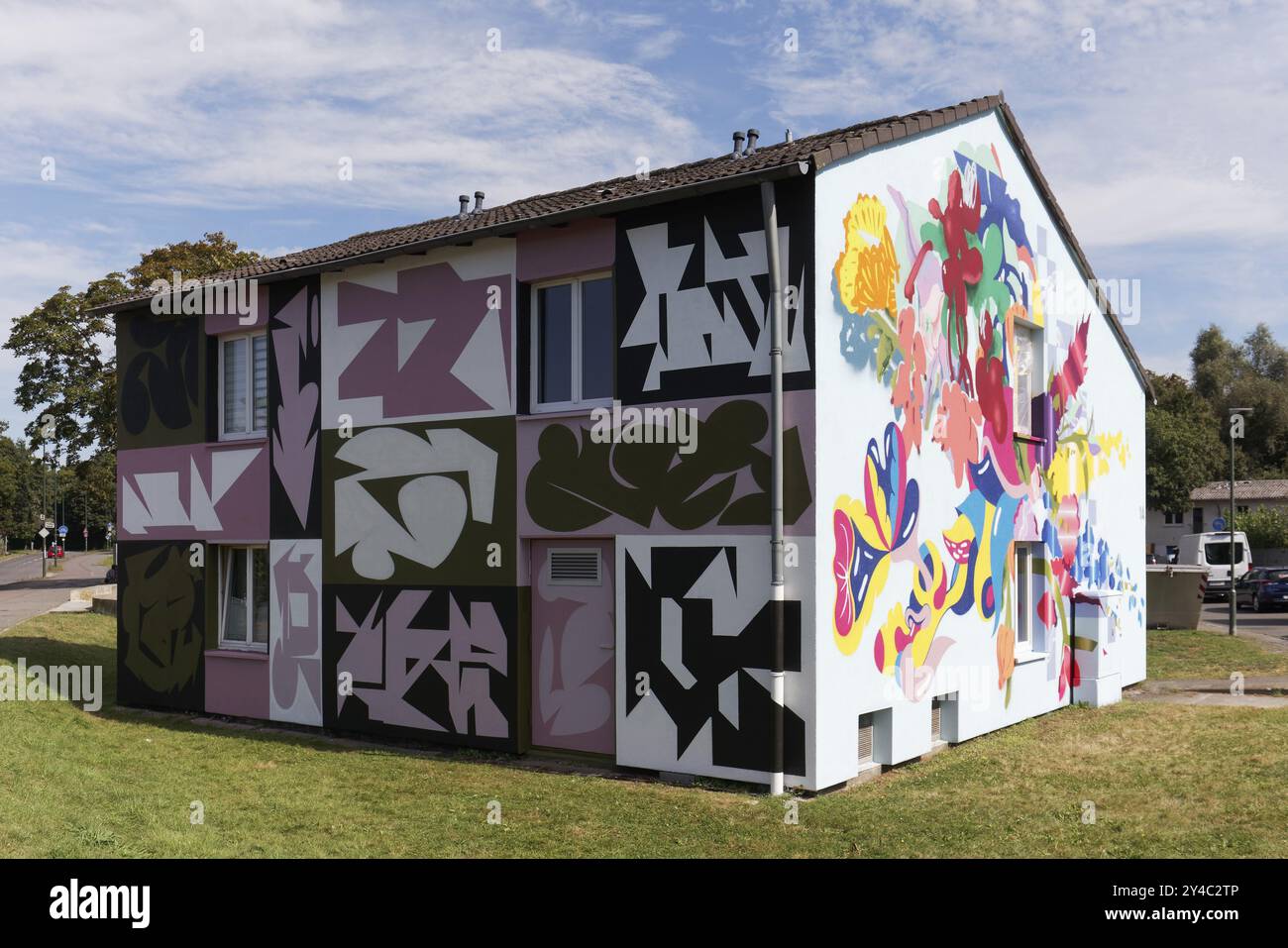 Residential building with mural by street artists Jan Herrmann and Tim ...