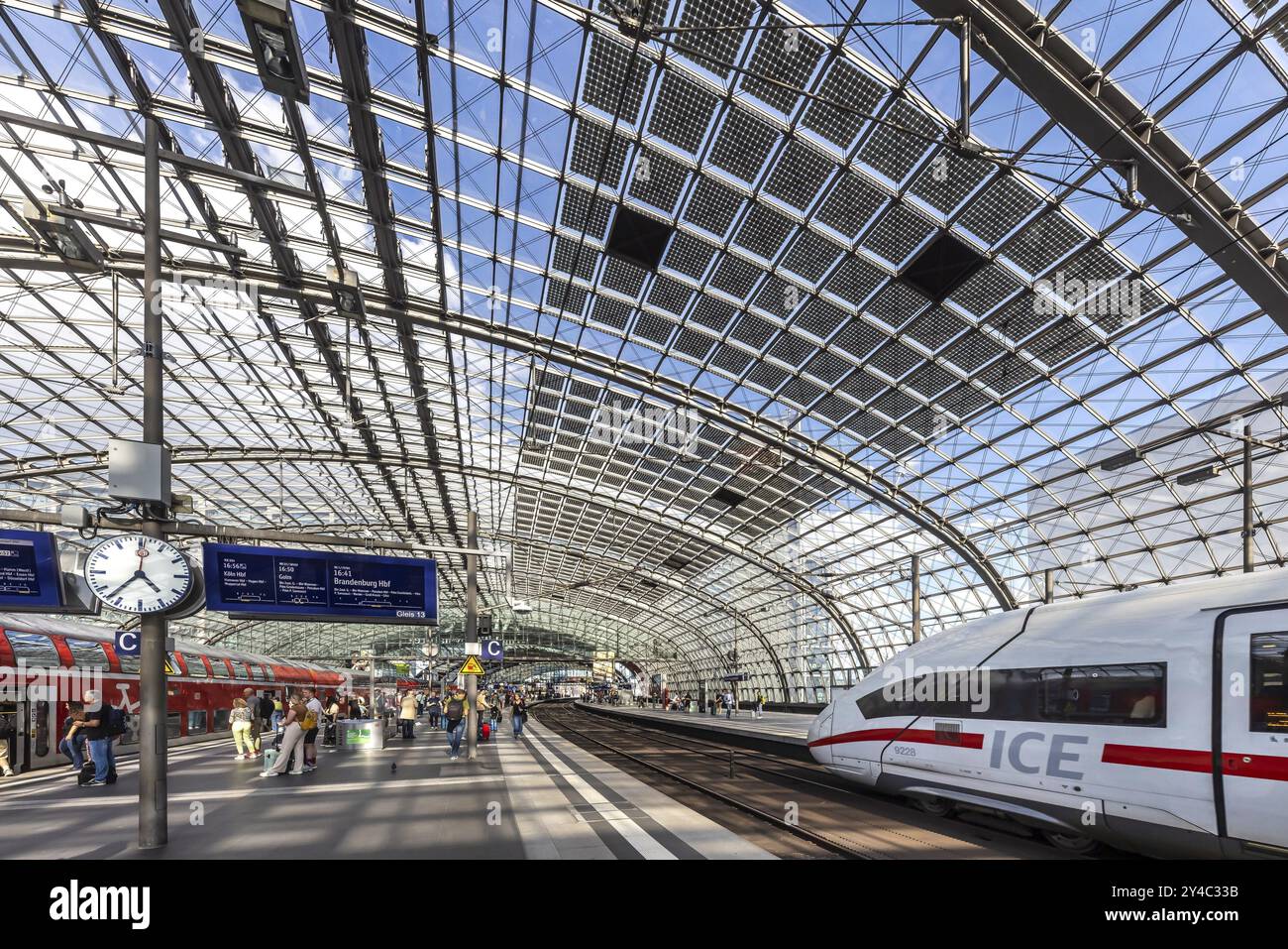 Central station with platform hall with glass roof construction with ...
