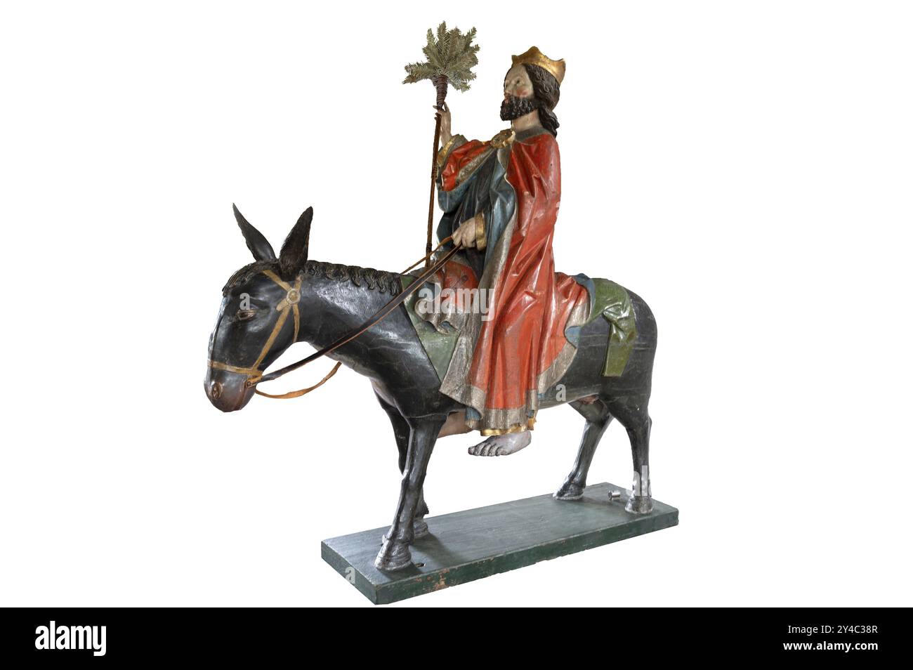 Christ on the palm donkey on a white background, wooden figure from ...