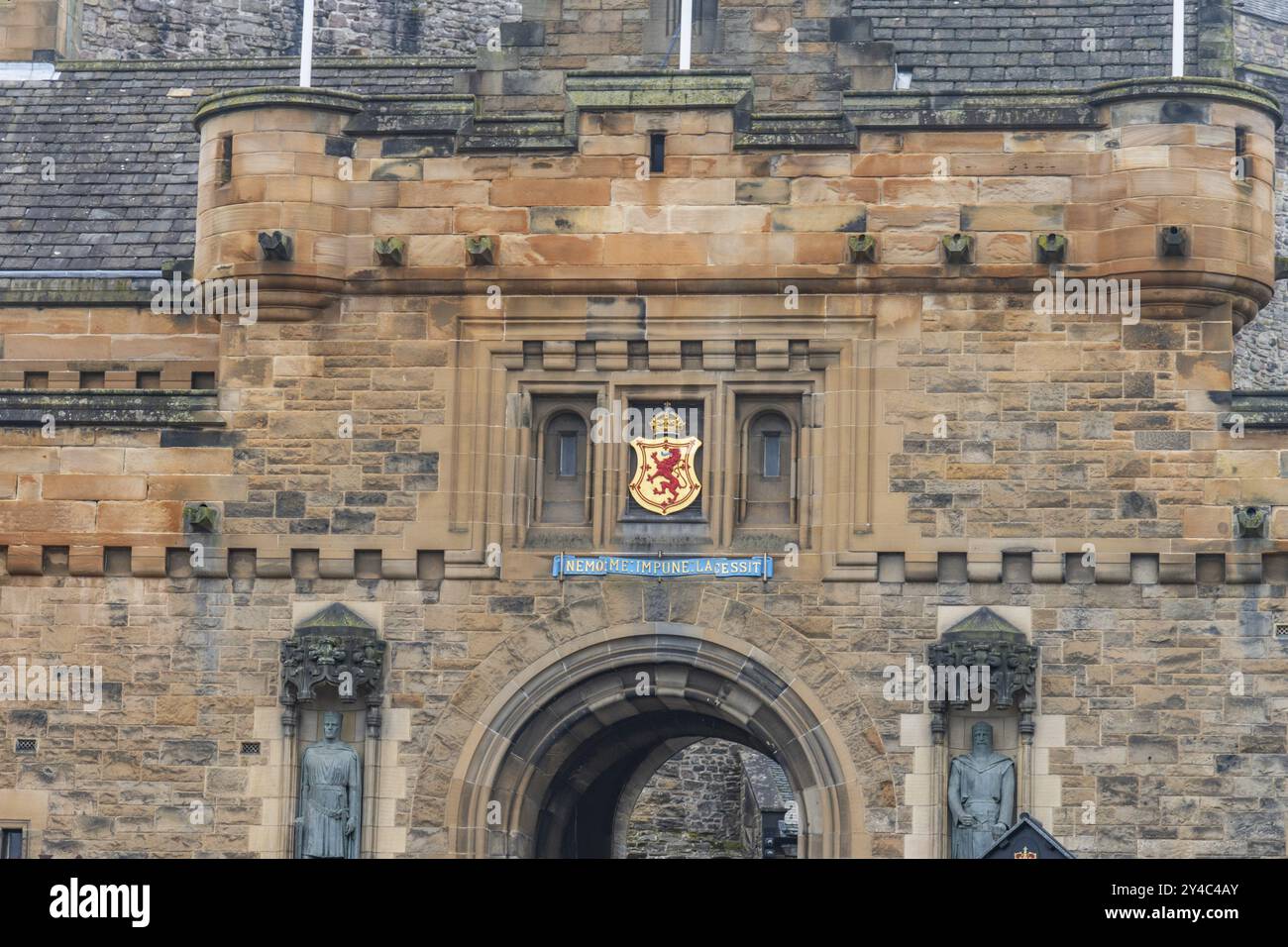 The detailed castle gate with a royal coat of arms of a medieval ...