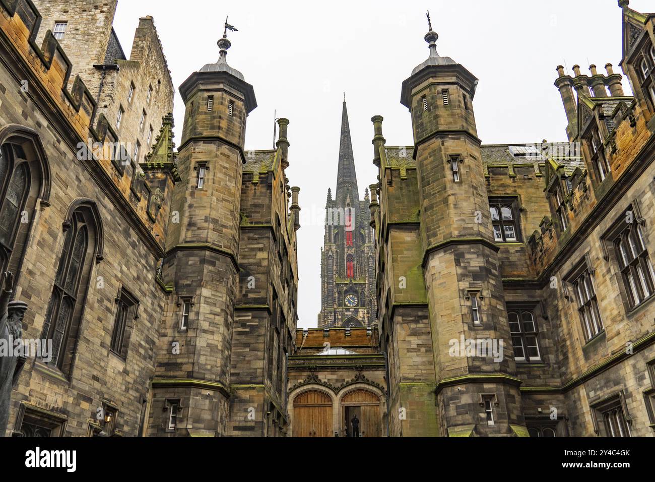 A monumental building with high towers and gothic architecture under a ...