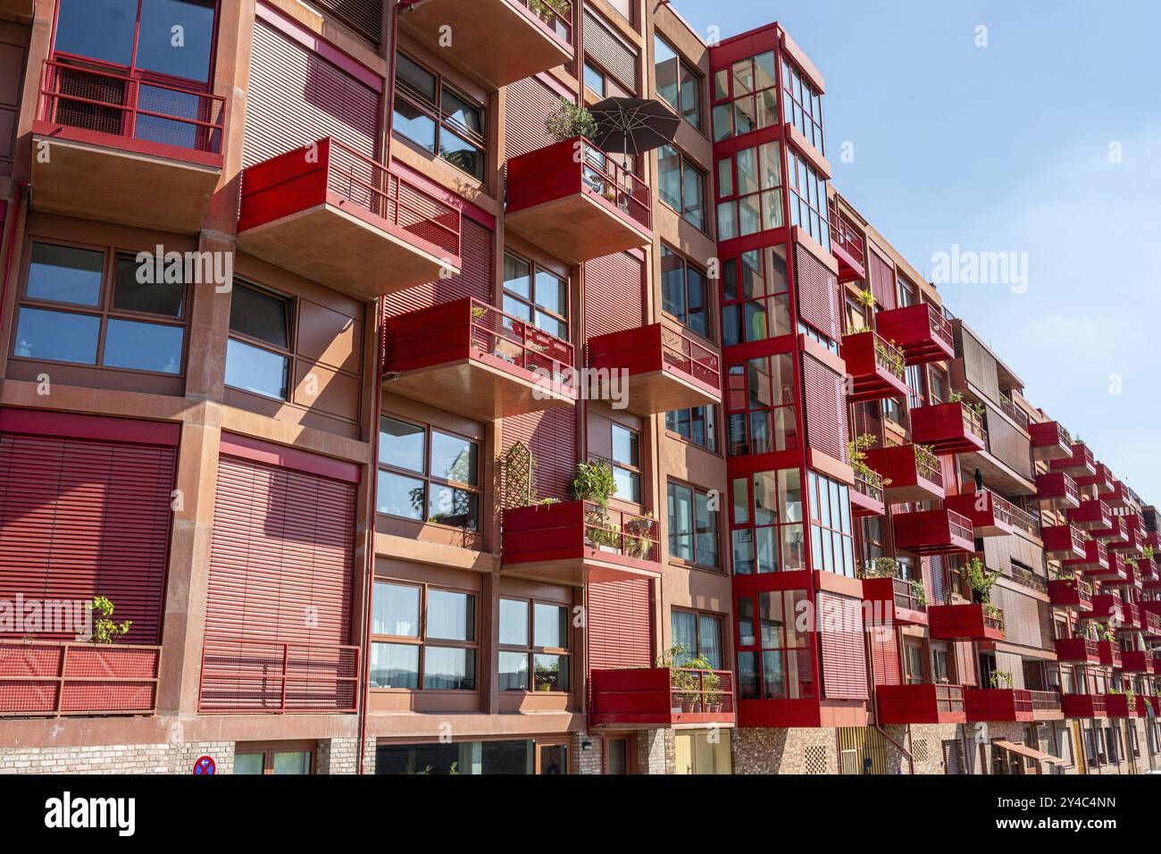 New red apartment block with balconies in Berlin, Germany, Europe Stock ...