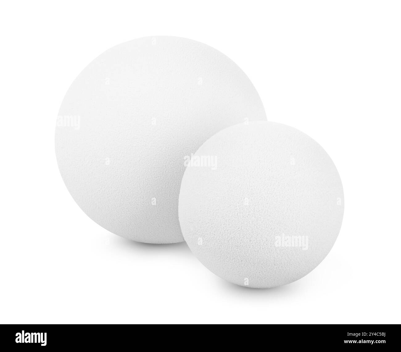 Two white spheres isolated on a white background Stock Photo - Alamy