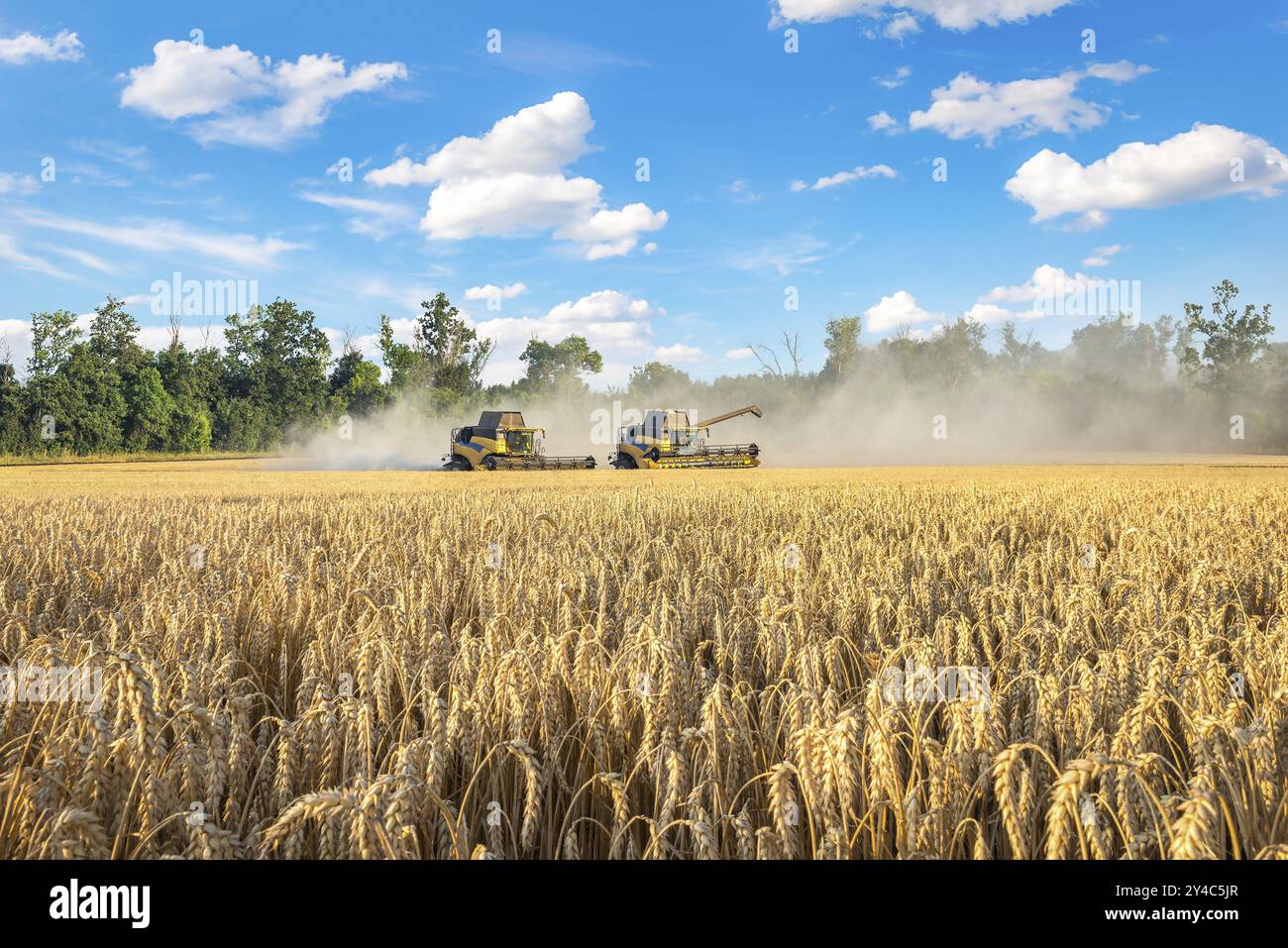 Two harvesters in wheat hi-res stock photography and images - Alamy
