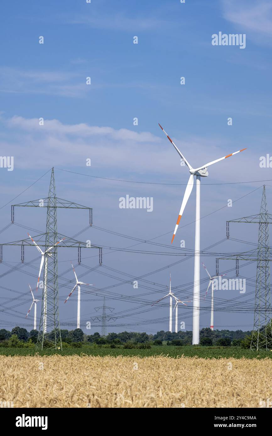 Wind turbines, power lines and electricity pylons in Germany Stock ...