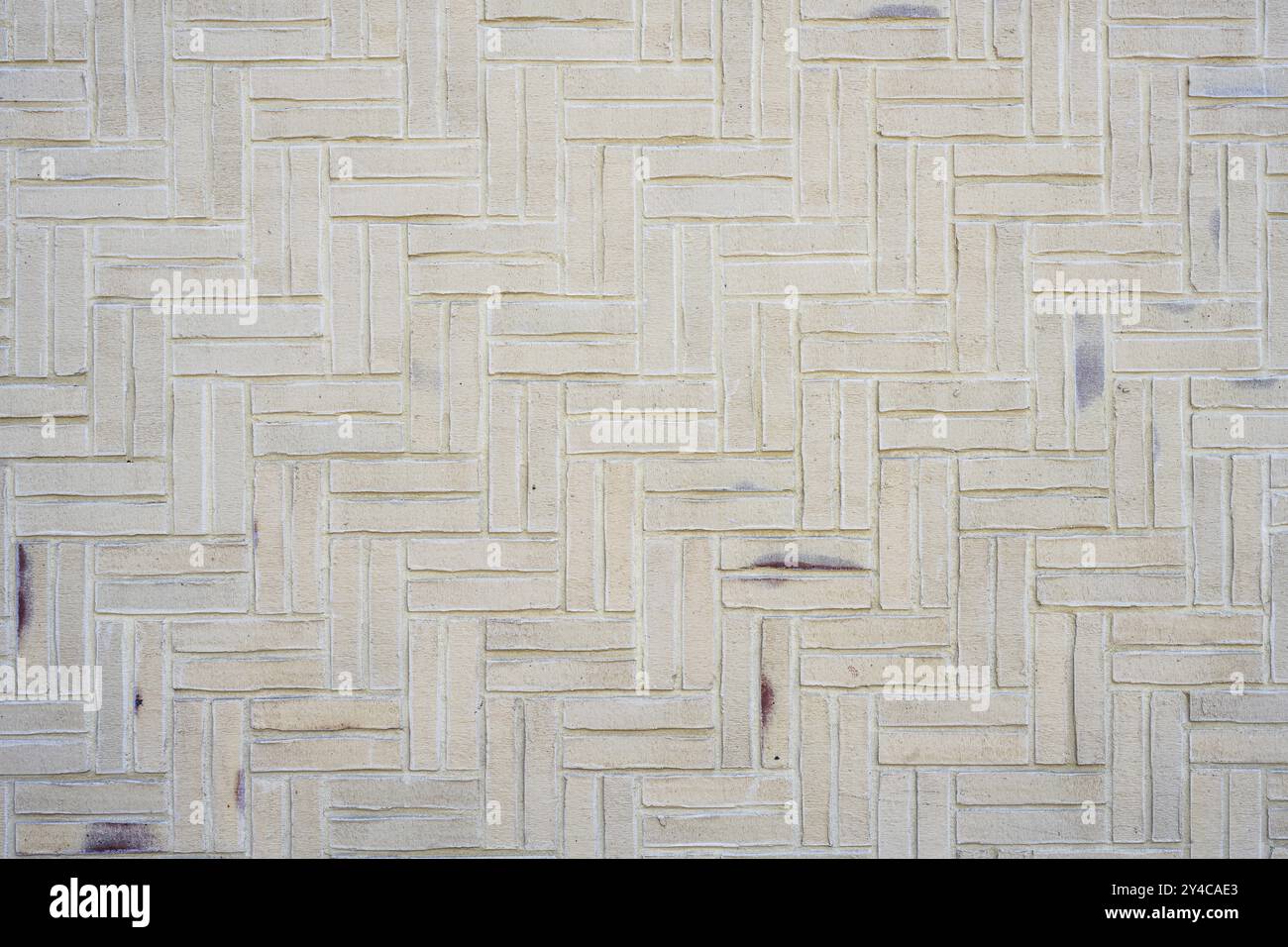 Background made from a wall of small beige bricks Stock Photo - Alamy