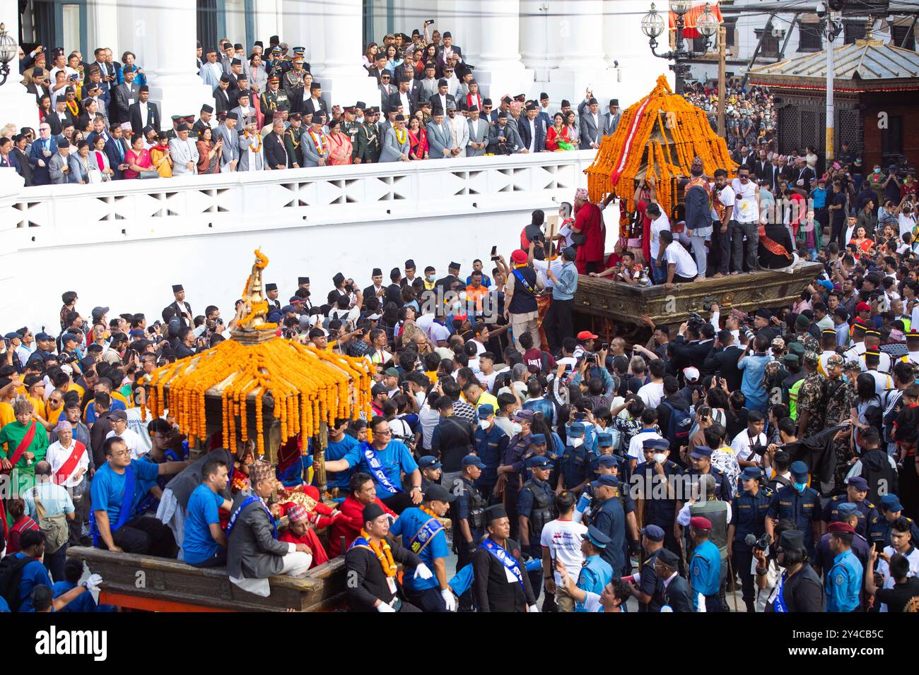 Devotees pull a chariot carrying, Kumari a child revered in Nepal as a ...