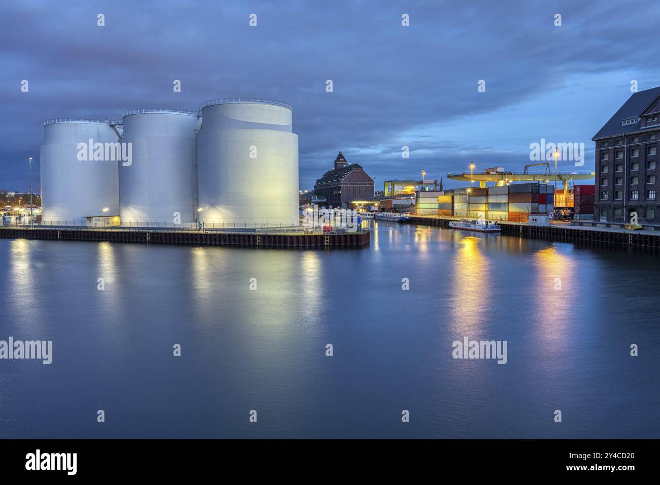 Storage tanks and part of the harbour in Berlin at night Stock Photo ...