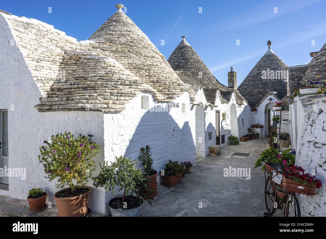 The beautiful trulli houses of Alberobello in Apulia, Italy, Europe ...