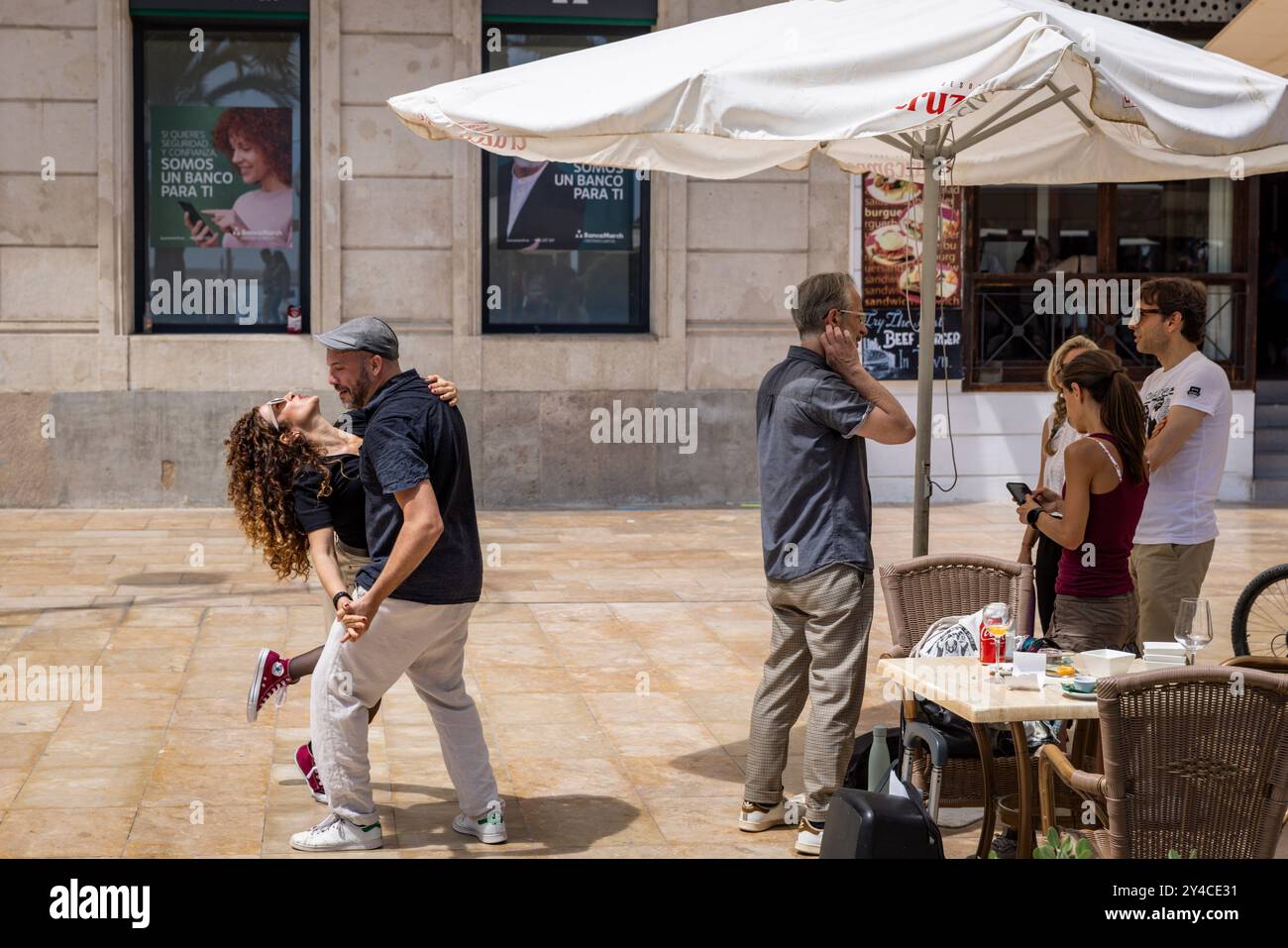 A man and woman laughing and having fun while Salsa dancing in the ...