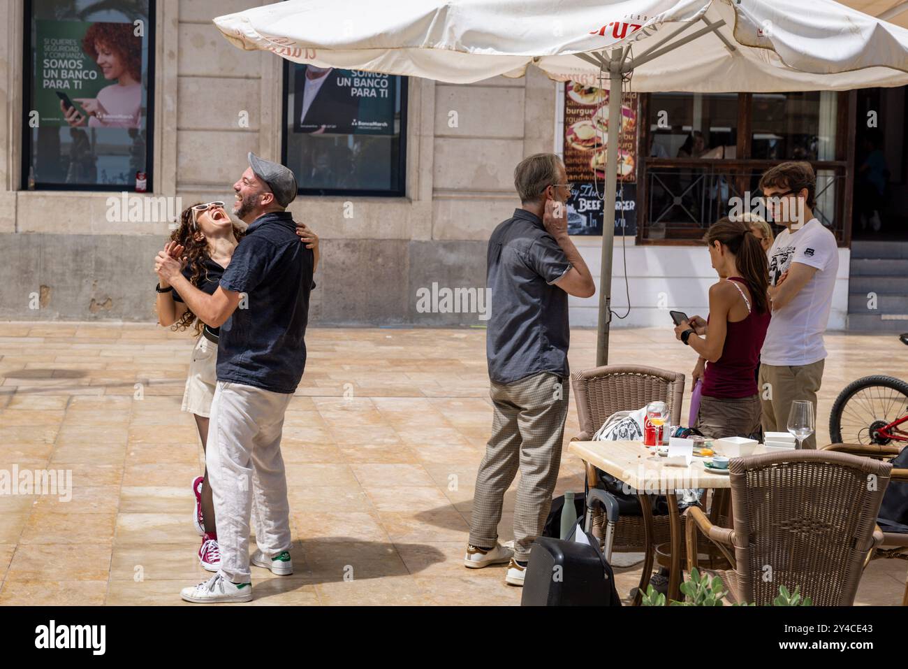 A man and woman laughing and having fun while Salsa dancing in the ...