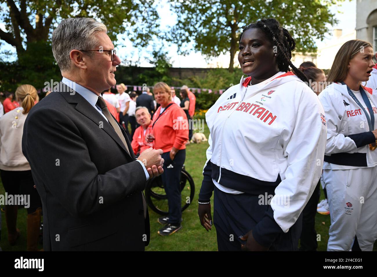 Prime Minister Sir Keir Starmer talks to paralympic athlete Funmi ...