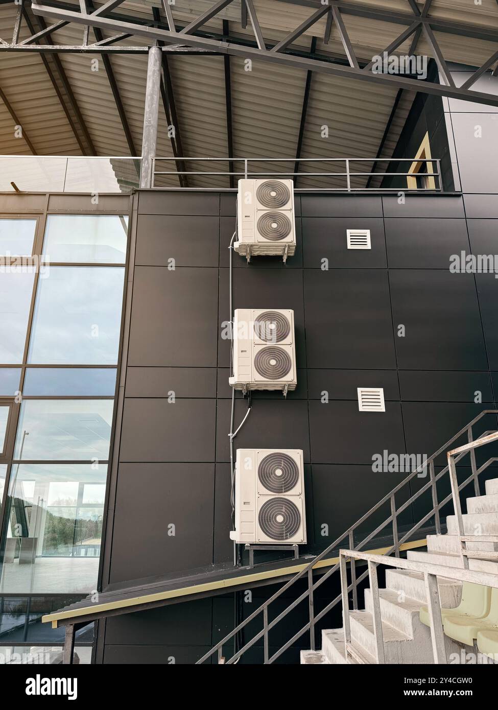 HVAC units installed on industrial building with steel roof and ...