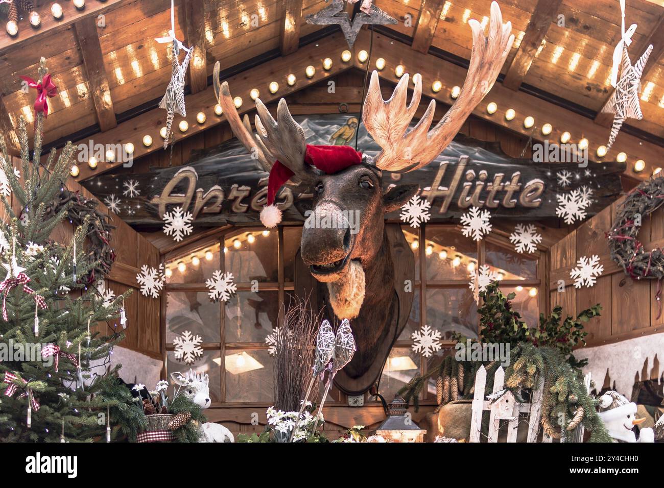 Christmas market hut with elk and Christmas decorations Stock Photo - Alamy
