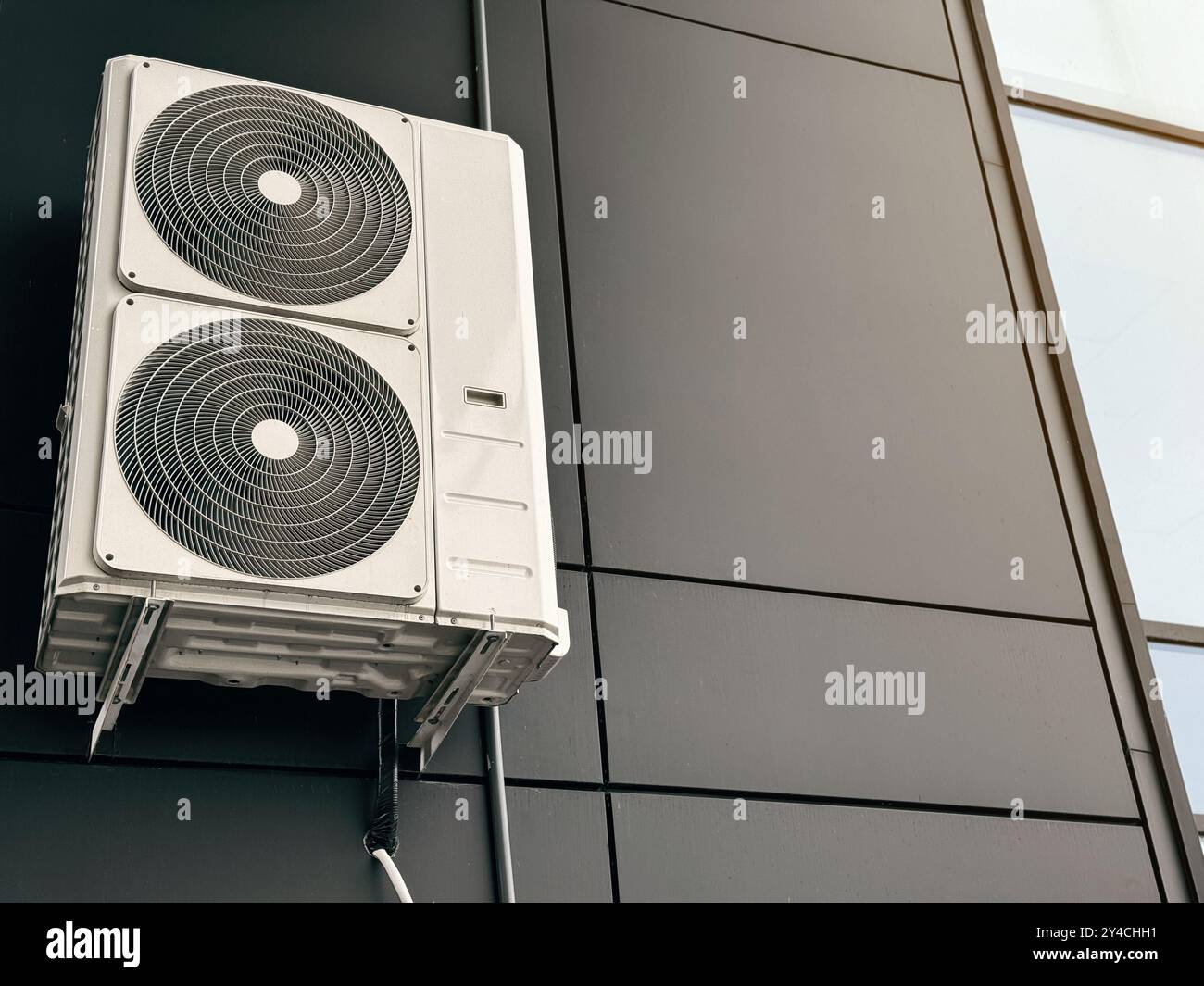 Outdoor HVAC units on steel-framed modern building Stock Photo - Alamy