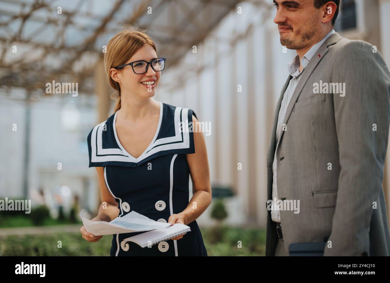 Professional business meeting with colleagues discussing ideas in an ...